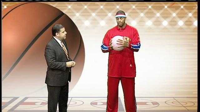 John Oakey talks with Harlem Globetrotters player