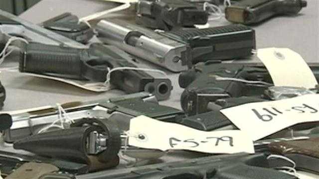 Local police department auctions off guns and cars