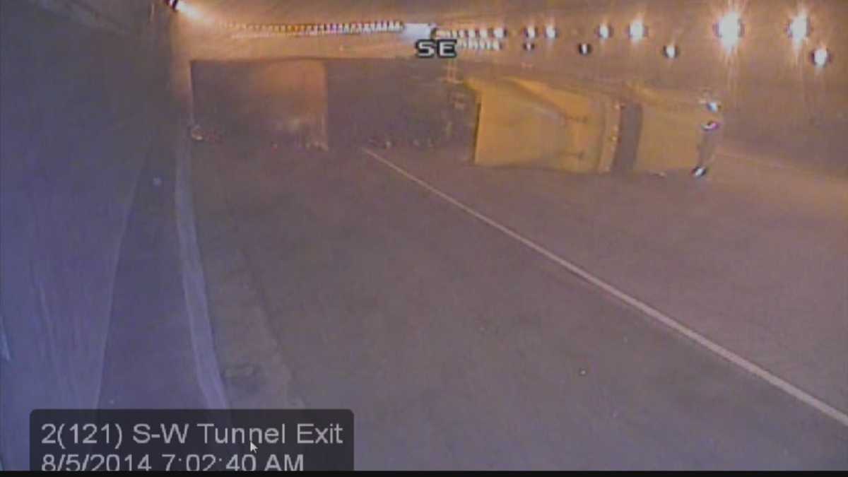Trucker cited after semi tipped over in Mitchell Interchange tunnel