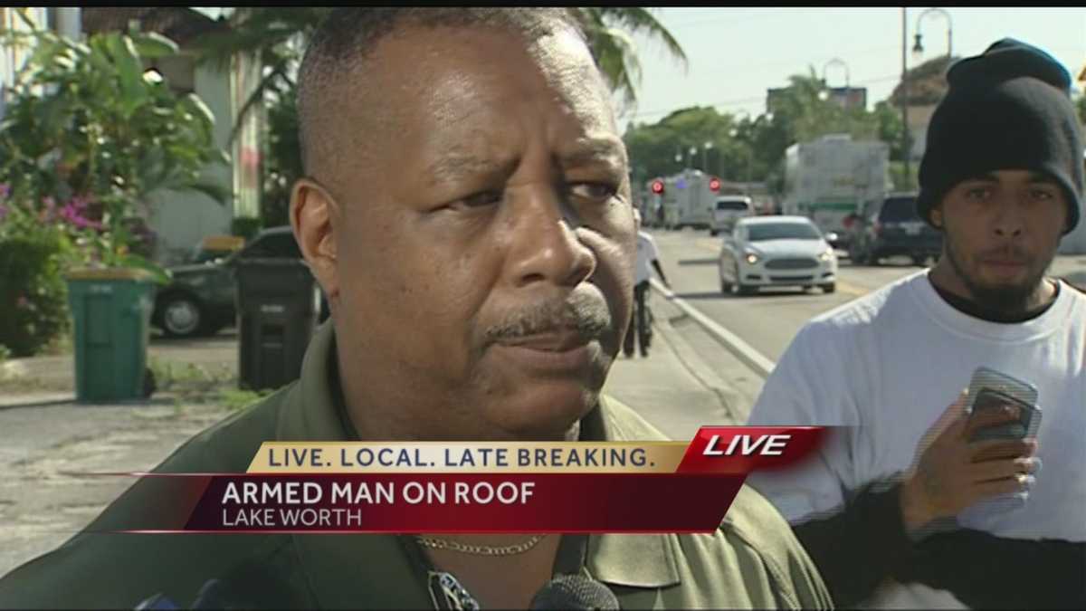 PBSO: Armed man on roof in custody, scene cleared