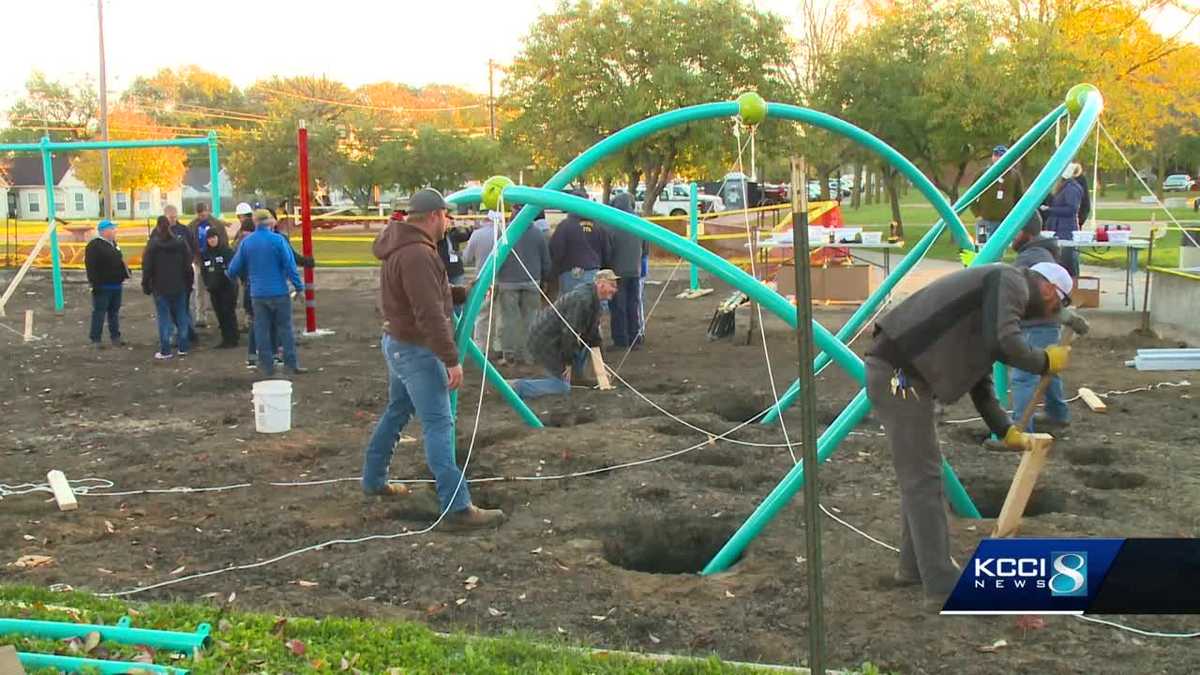 Army of volunteers build new playground at metro park