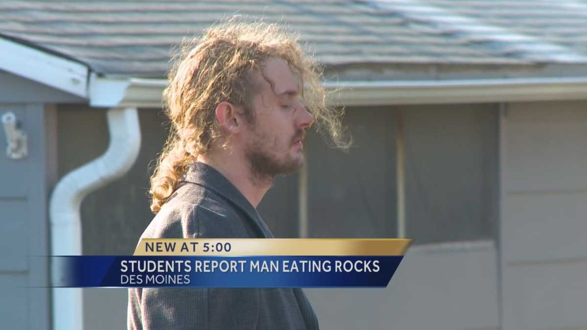 Students spot man eating rocks