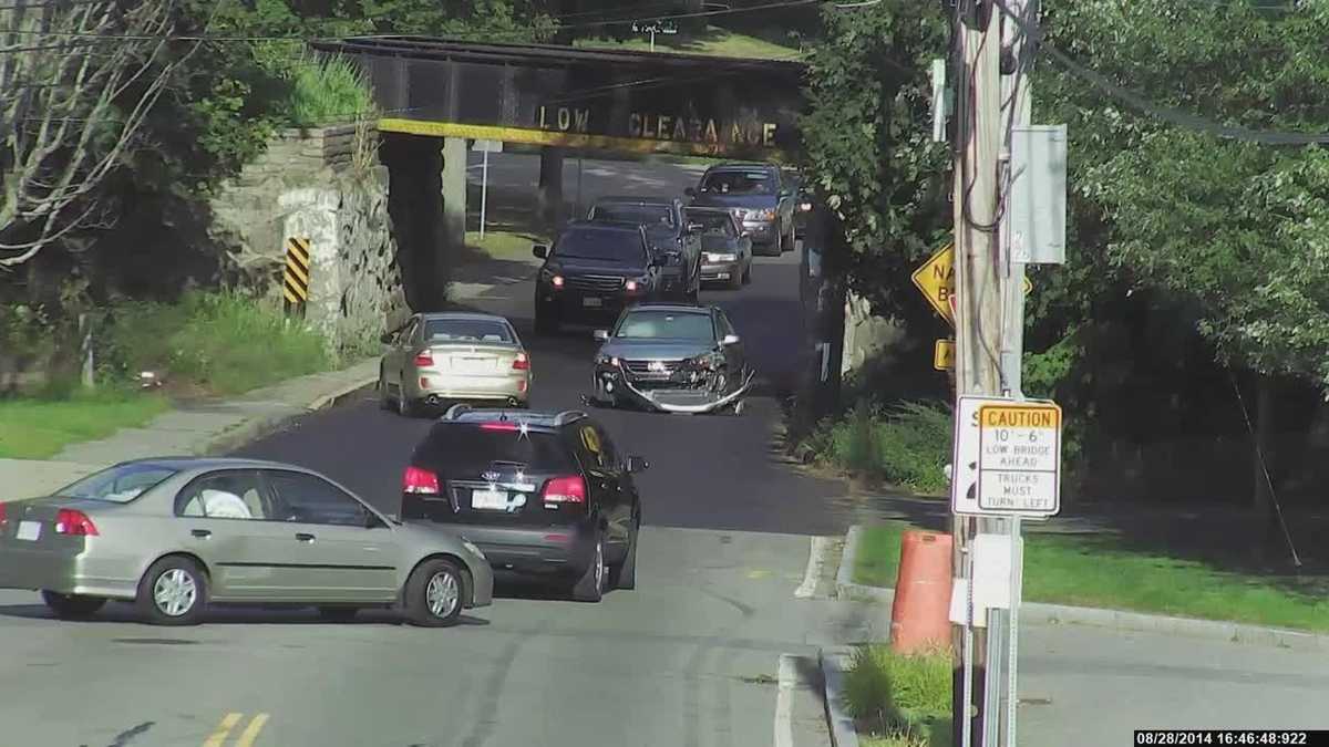 Video shows car crashing into train bridge wall