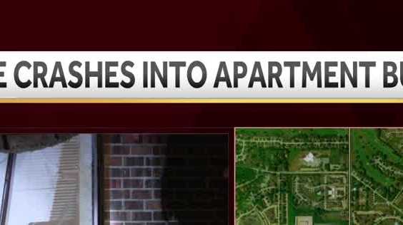 Car crashes into Omaha apartment building