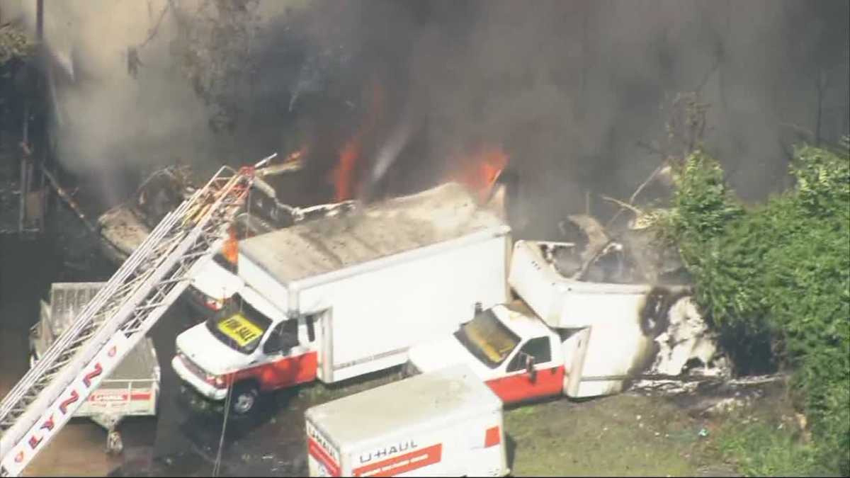 Fire strikes vacant warehouse, U-Haul trucks