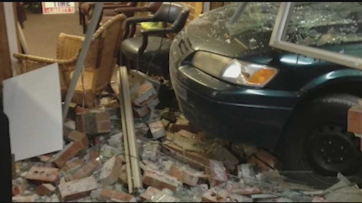 Car crashes into building