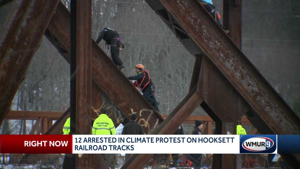 Climate demonstrators arrested on railroad bridge in Hooksett