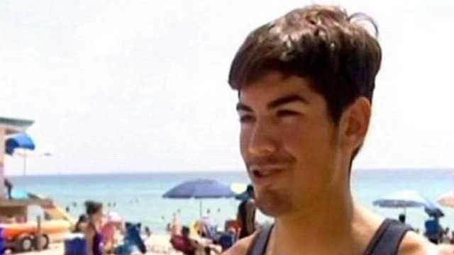 Hero lifeguard reacts after firing