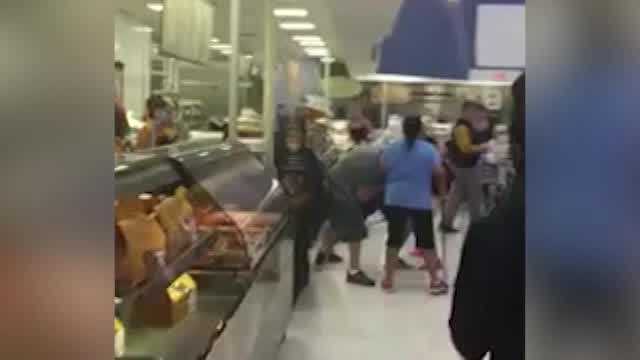 Caught on camera: 2 men brawl at Florida grocery store