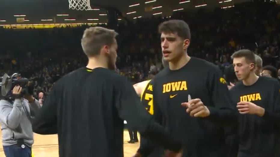 No. 18 Iowa rallies to beat Wisconsin 68-62