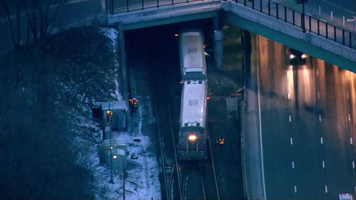 Hours after derailment, MBTA still working to remove Commuter Rail train