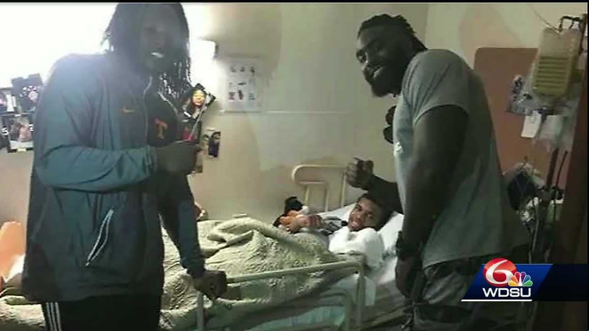 SPECIAL SURPRISE! Saints players visit teenager shot on Fat Tuesday