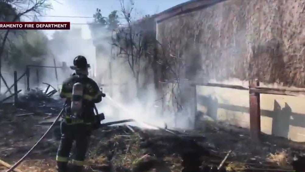 Wind spreads fire behind vacant home in Sacramento