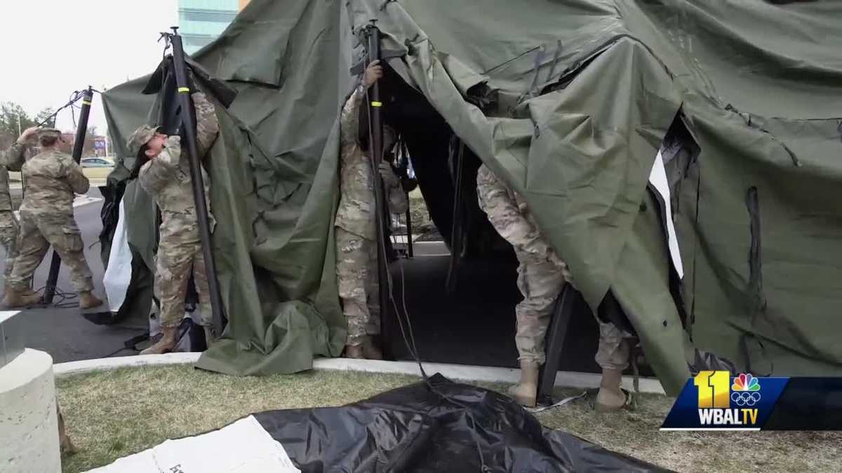 National Guard members working across Maryland to set up triage tents ...