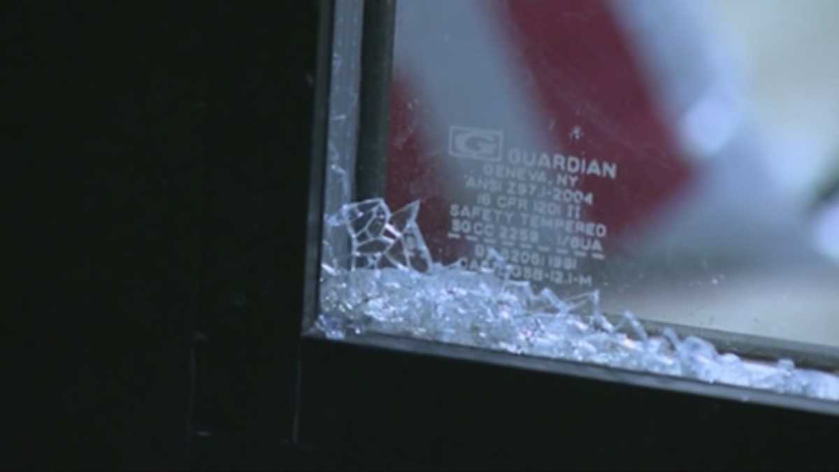 Police investigate more than 2 dozen broken windows