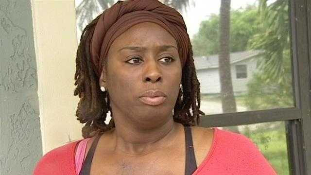 Woman set on fire says she's powerless against squatters