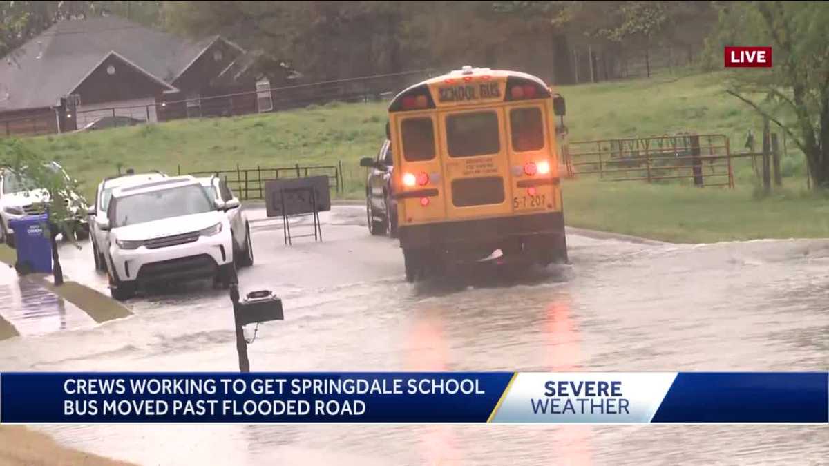 Springdale school bus rescued from flooded road in Elm Springs