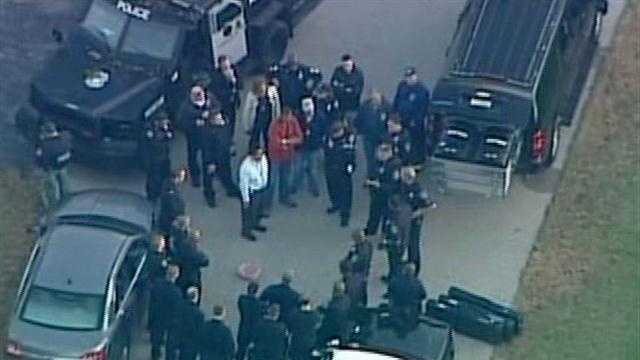 SWAT team, bomb squad descend on shooting suspect's home