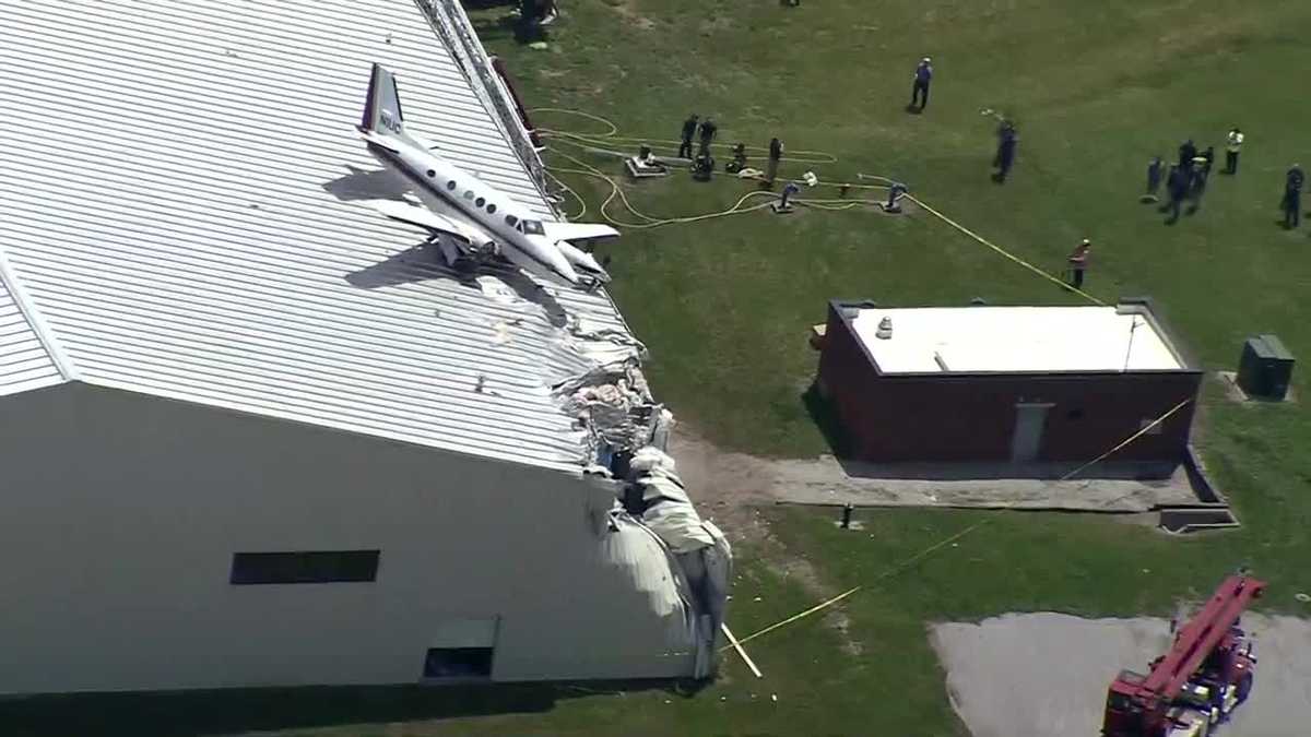 New Century Airport - Plane crashes into hangar roof Monday