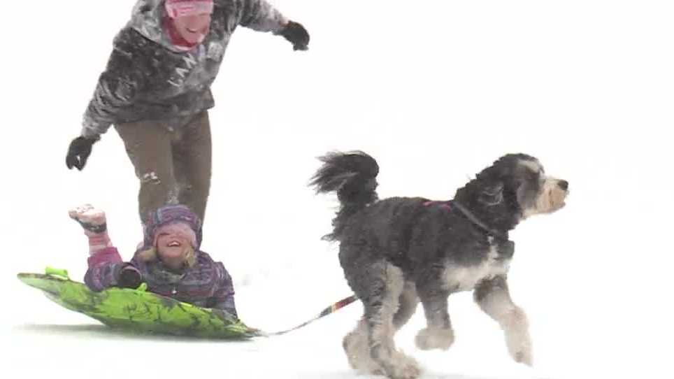 Road conditions leads to stranded drivers, kids enjoy snow day