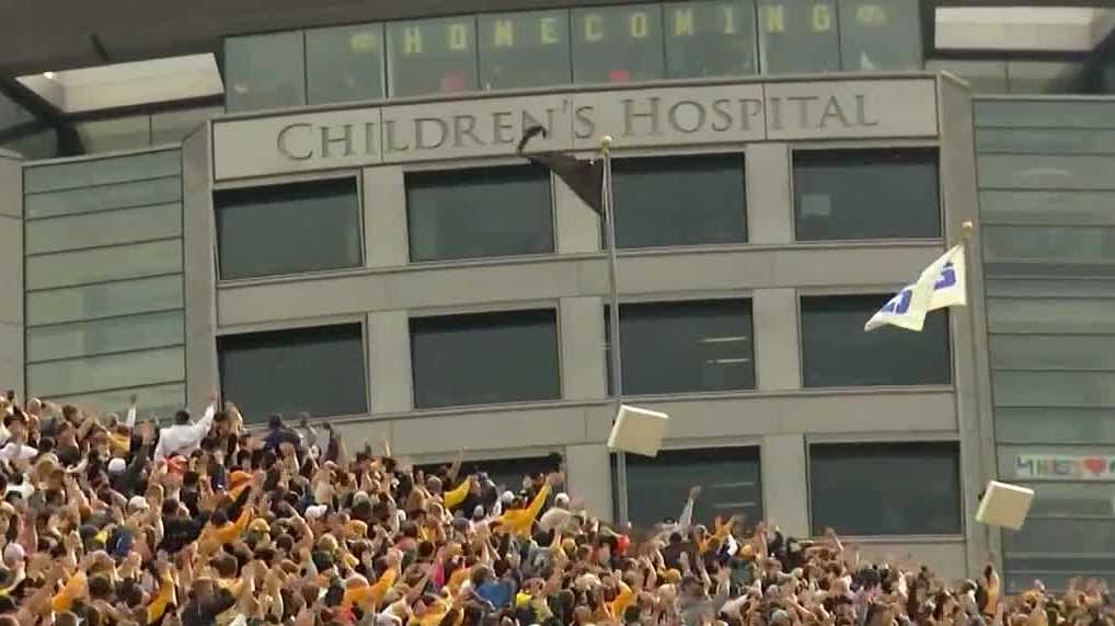 Dozens of families affected by childhood cancer experience 'Hawkeye ...