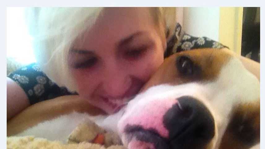 Woman reunites with lost dog "Dottie"