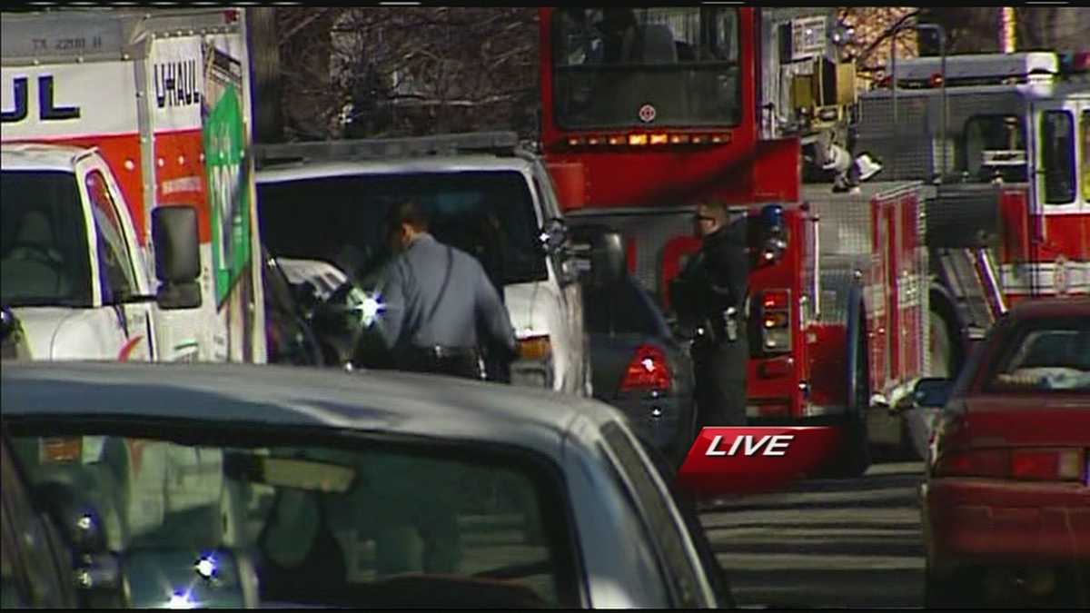 Police surround home in northeast KC