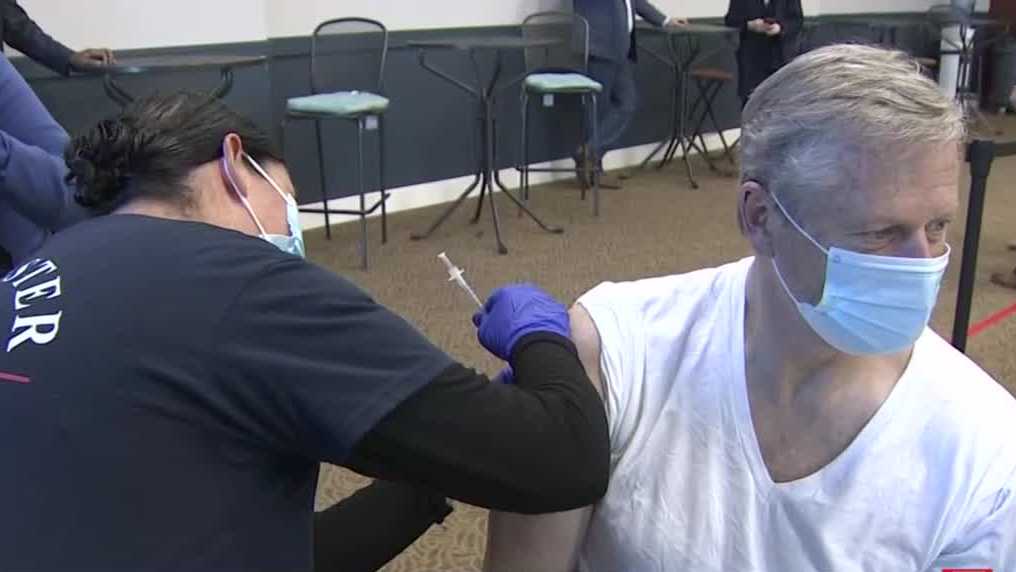 Baker expects more booster sites as people scramble for appointments