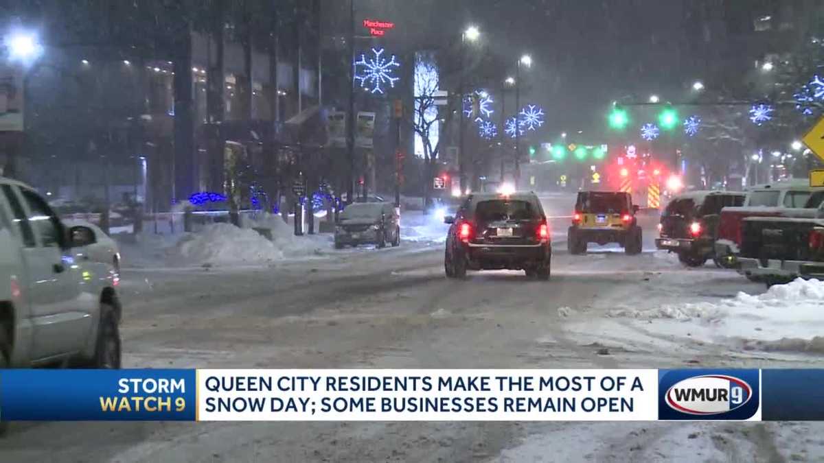 Manchester residents make the most of snow day; some businesses remain open