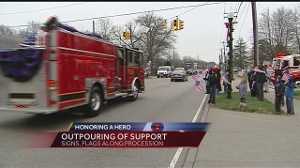 People line procession route to honor firefighter who died fighting fire