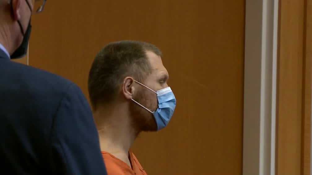 Murder suspect arraigned on charge of assaulting corrections officer