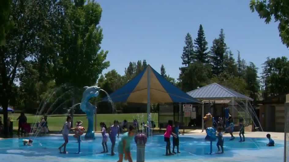 Families head to Discovery Park and local splash parks to beat the heat