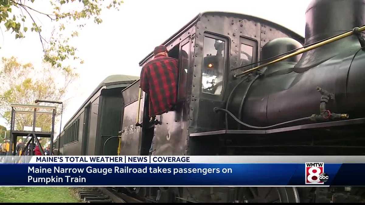 Passengers take ride aboard pumpkin train