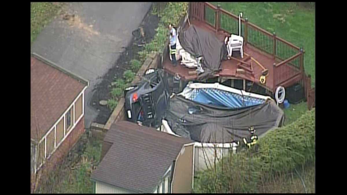 Raw video: Car crashes into pool at Ross Township home