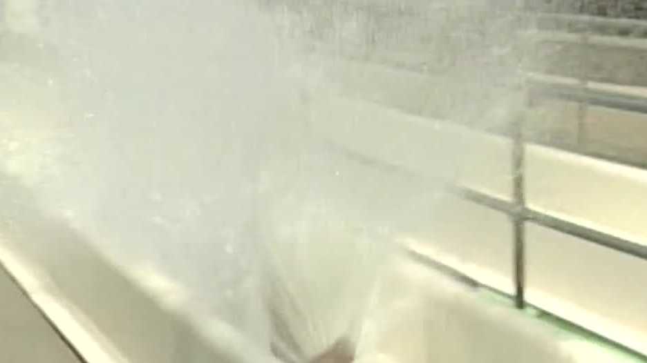 From the archives: Tom Griffith makes his way down Geronimo water slide