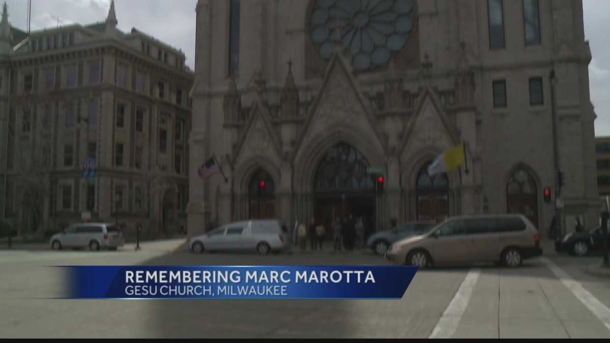People gather to pay tribute to Marc Marotta