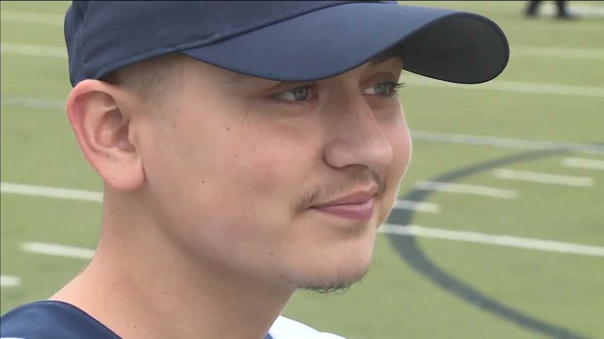 Teen with cancer returns to football field as team captain