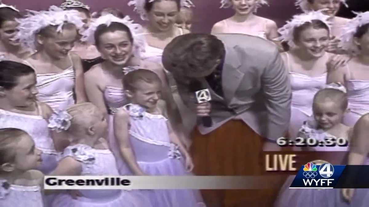 Looking back at John: Wearing a tutu next to his daughter.