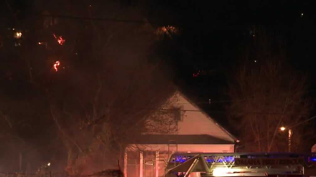 Omaha Fire Department battles flames in early morning house fire