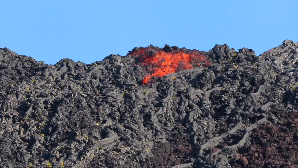 Watch lava tumble down side of Hawaiian volcano