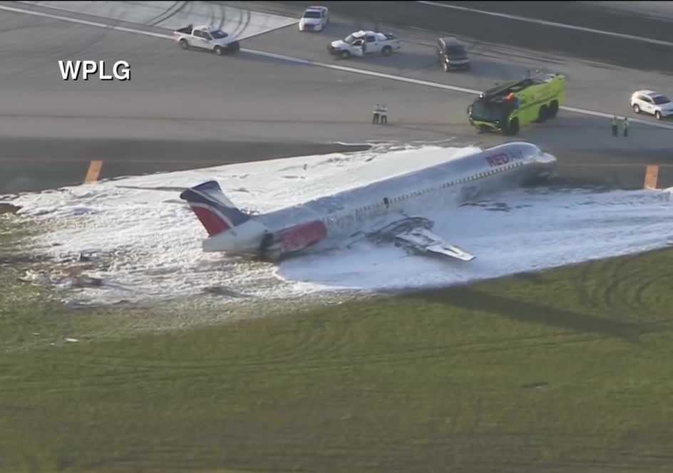 Plane catches fire at Miami airport, 3 minor injuries