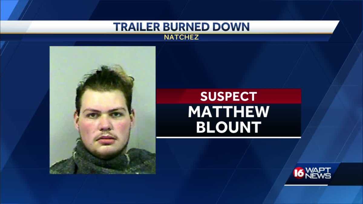 Man arrested after trailer set on fire