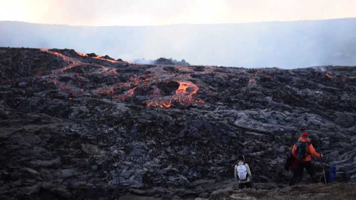 VIDEO: Guests watch as lava pours from volcano
