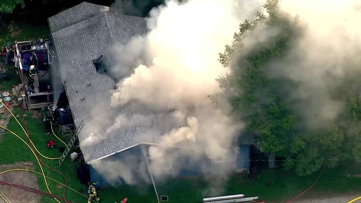 VIDEO: Flames shoot through roof of Oldham County home