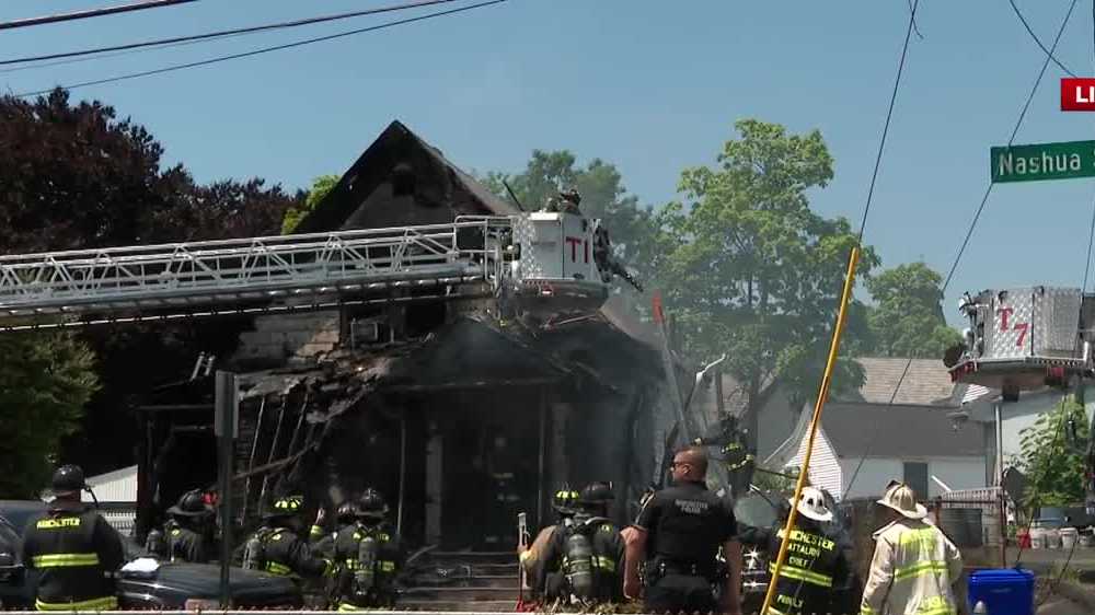 Firefighters battle fire at home in Manchester