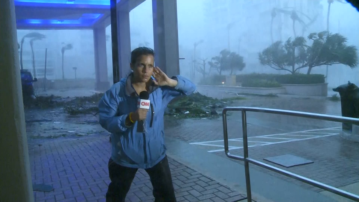 Hurricane Maria's strong winds cause reporter to stumble