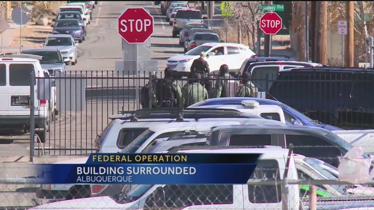 Officials swarm downtown building