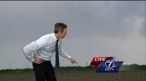 Bill Randby watches as a tornado forms on live TV