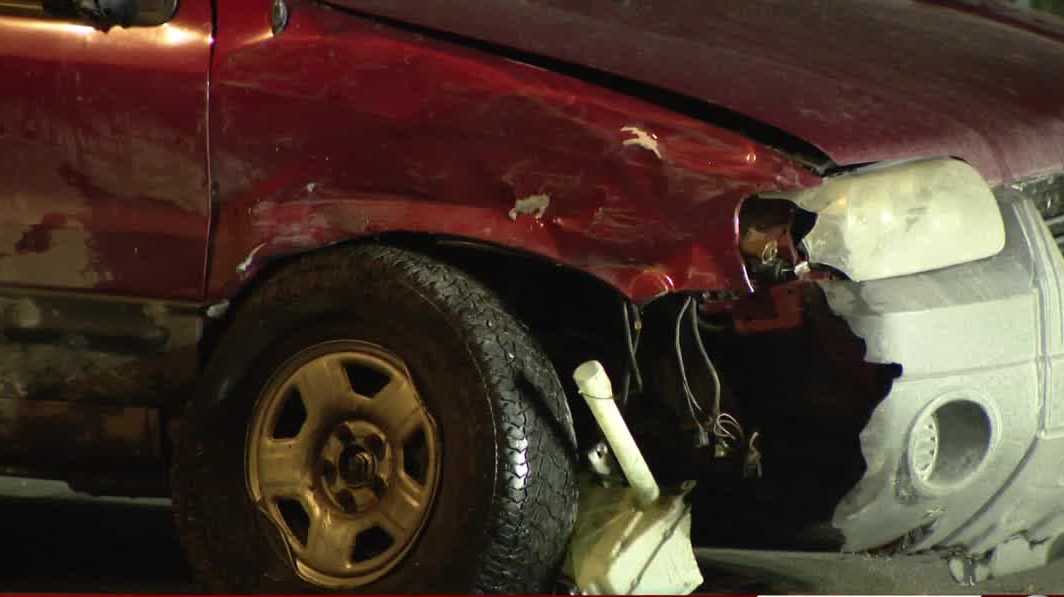 Driver injured after overnight crash into stop sign