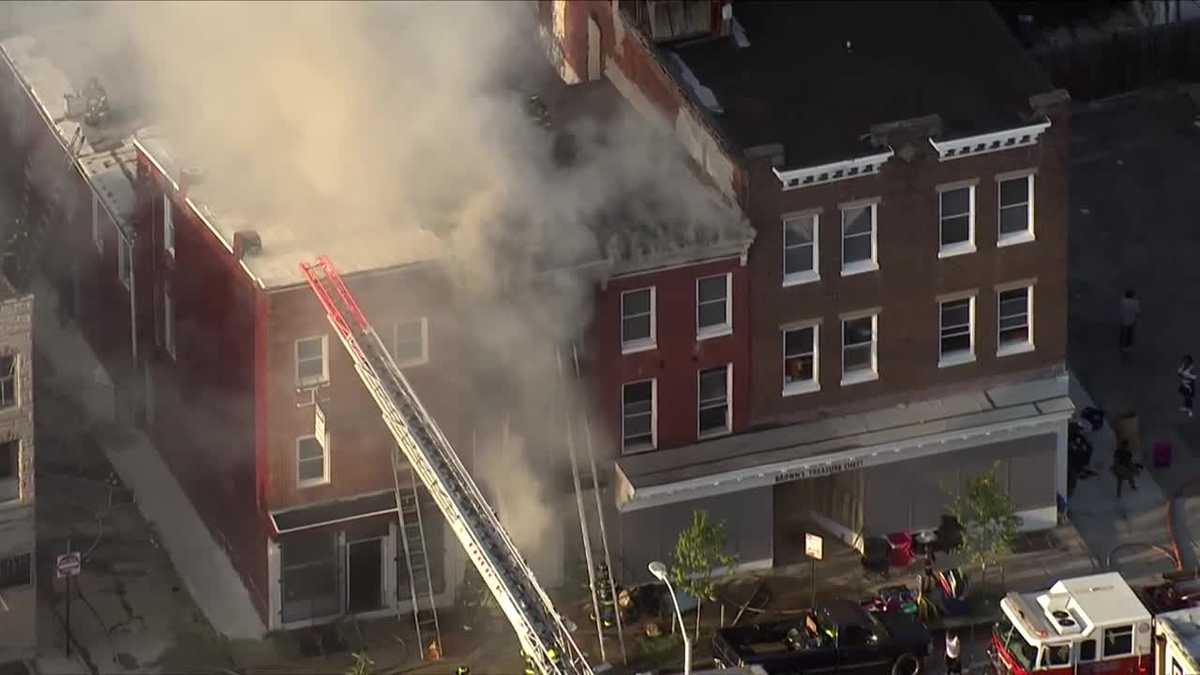 Fire crews battle heavy smoke, fire at vacant storefront in SW Baltimore